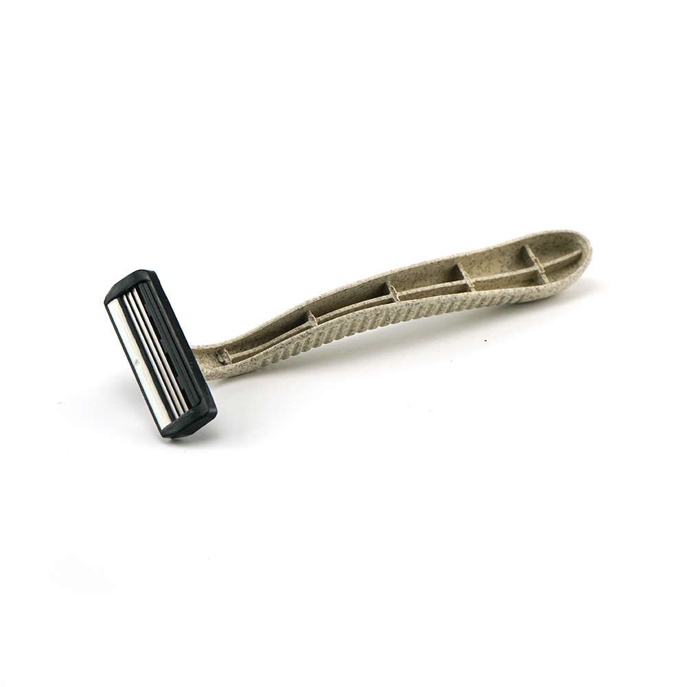 Disposable biodegradable twin blade razor