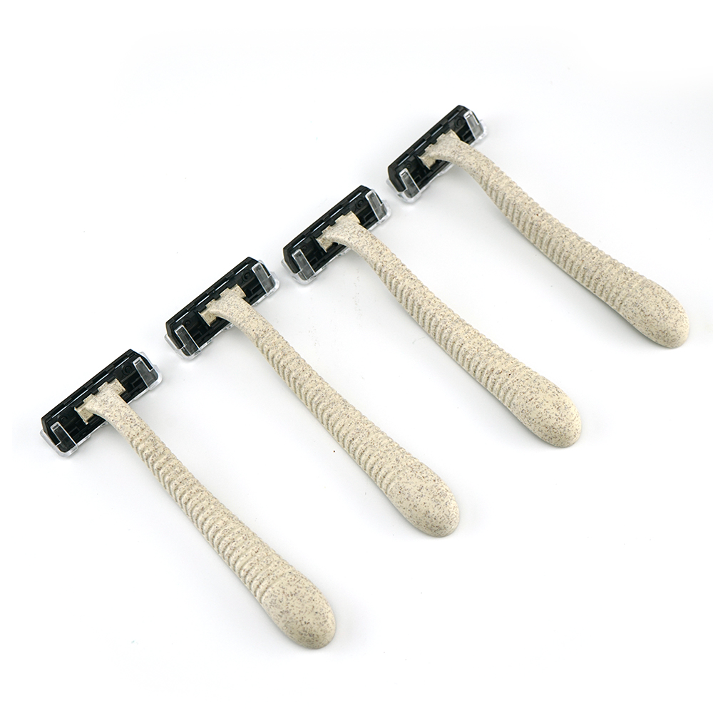 Disposable biodegradable twin blade razor