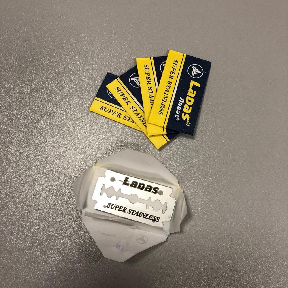 Disposable shaving single edge razor blades