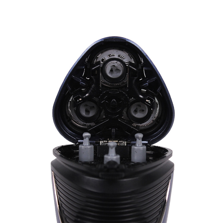 Three cutter head floating electric shaver